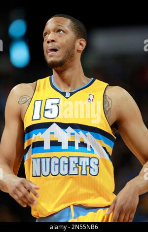 Denver Nuggets forward Anthony Randolph, right, loses control of the ...