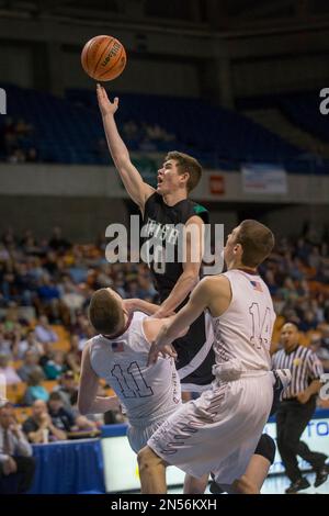 Charleston Catholic's Garret McCarty (10) goes up for a layup during ...