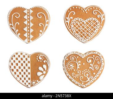 Set of Christmas gingerbread heart shaped cookies on white background ...