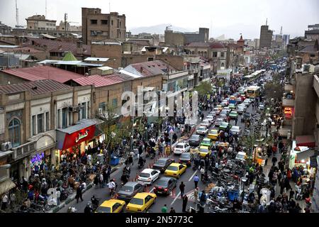 Street view in the downtown of Tehran with poster of Supreme Leader of ...