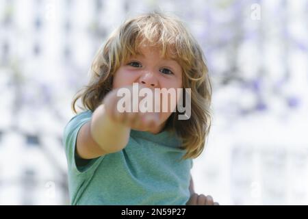 Child with angry expression. Angry hateful little boy, child furious ...