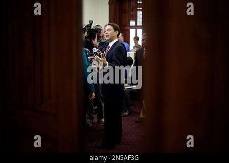 Georgia Sen. Jason Carter, D-Decatur, turns away from reporters as he ...