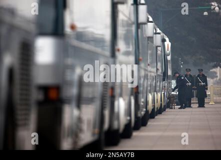 Chinese paramilitary policemen patrol the Tian'anmen Square on a ...