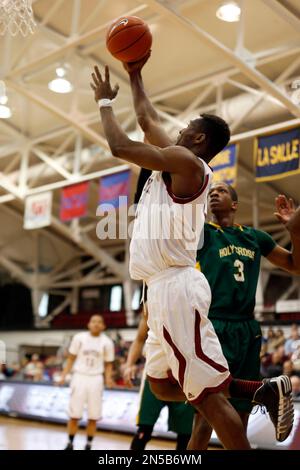 Cardinal Hayes Nathan Ekwu #1 in action against the Holy Cross Knights ...