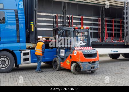Freight transport, professional drivers in the loading zone, loading ...