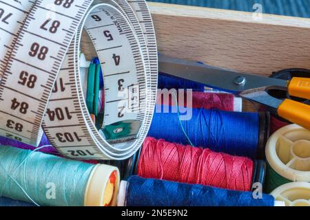 Bulk spools of thread in sewing box Stock Photo - Alamy