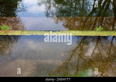Little dam at a mill race Stock Photo - Alamy