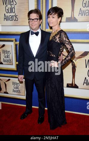 Eric Warren Singer, left, and guest arrive at the Writers Guild Awards ...