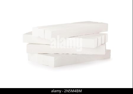 Small pieces of chalk on white background Stock Photo - Alamy