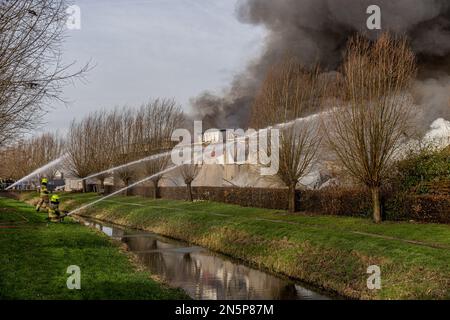 HETEREN, NETHERLANDS - FEBRUARY 9: Large structure fire in Poort van ...