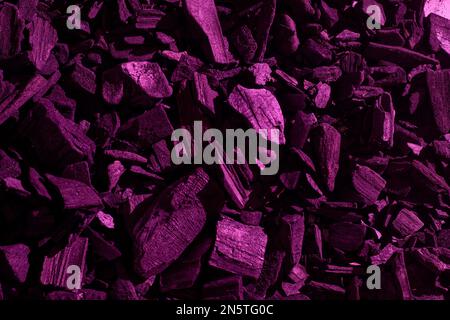 Natural black charcoal with a purple tint. Industrial coal. Pile of ...