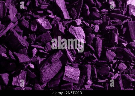Natural black charcoal with a purple tint. Industrial coal. Pile of ...