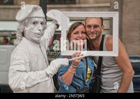 Mime on Las Ramblas in Barcelona sitting on toilet reading newspaper ...