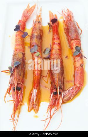 Fresh large red prawns or shrimp on display at the fish market in the ...