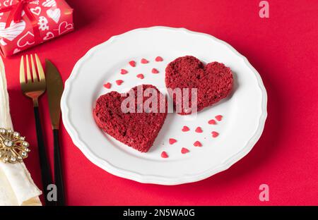 Red velvet sponge cakes in the shape of hearts Stock Photo - Alamy