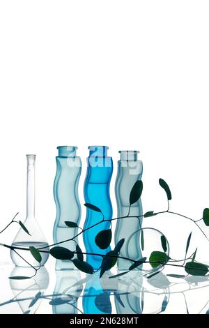 Monochromatic Surrealism - Transparent Flask and Water-filled vases ...