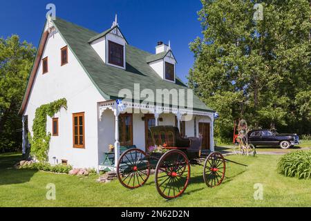Old 1927 white stucco with green trim cottage style home facade with ...