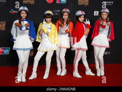 Members of South Korean K-Pop group I-DLE pose for photos during the ...