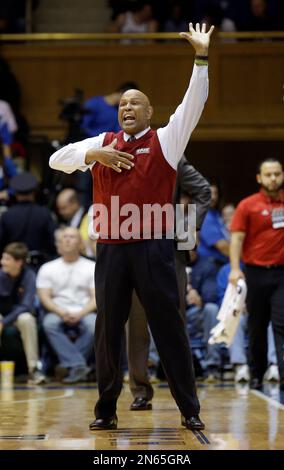 Florida Atlantic coach Mike Jarvis speaks with Marquan Botley (2 ...