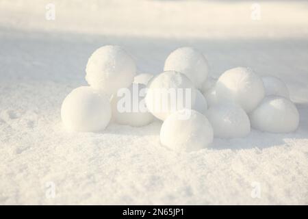 Pile of perfect round snowballs on snow outdoors Stock Photo - Alamy