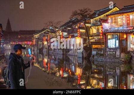 JIAXING, CHINA - FEBRUARY 9, 2023 - Tourists visit Xitang Ancient Town ...