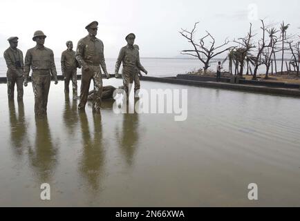 The Philippines, Leyte, Tacloban: statues in the grounds of the CAP ...