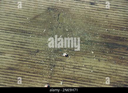 A field near Roselawn, Ind. is strewn with debris in this Nov. 1, 1994 ...