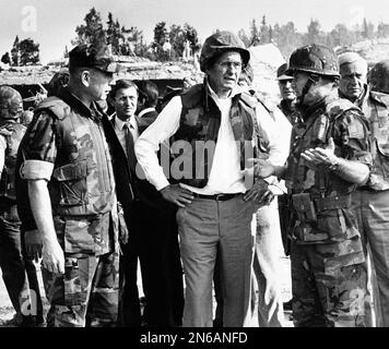 U.S. Marine Corps Col. Timothy S. Brady Jr, right, commanding officer ...