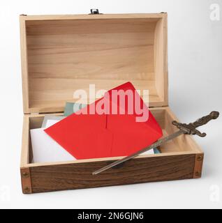 Opened wooden box, coloured envelopes, white background Stock Photo - Alamy