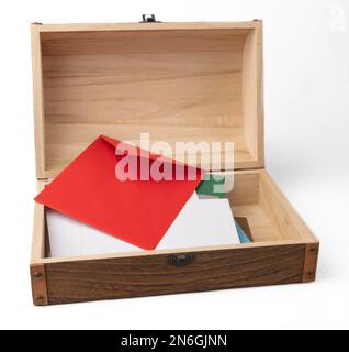 Opened wooden box, coloured envelopes, white background Stock Photo - Alamy