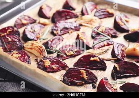 Roasted beetroot slices in baking dish, closeup Stock Photo - Alamy
