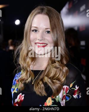 Actress Cara Theobold arrives on the red carpet at the premiere of the ...