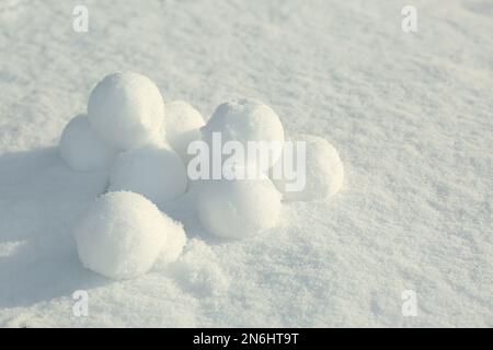 Pile of perfect round snowballs on snow outdoors Stock Photo - Alamy