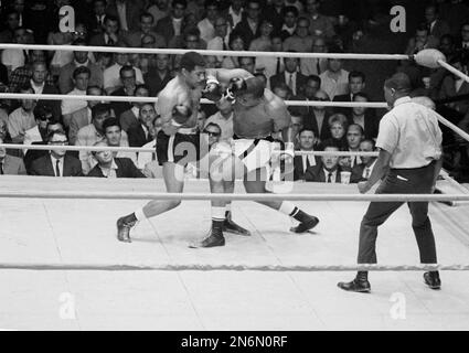 Former world heavyweight champion Sonny Liston stands calmly, arms by ...