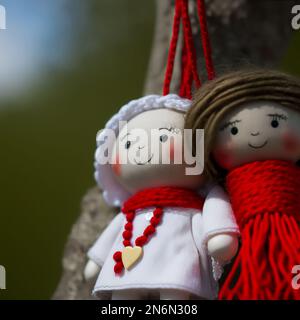 Traditional Bulgarian Martenitsa made of red and white wool, a symbol ...