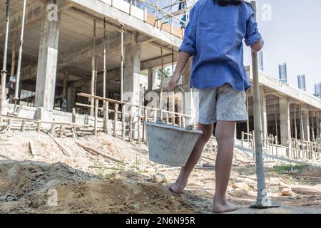 Poor children working at construction site against children labour ...