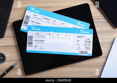 Flat lay composition with avia tickets and passport on white background ...