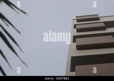 Perspective and lower angle view of the hotel building against the ...