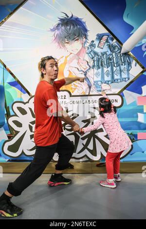 (230210) -- HAIKOU, Feb. 10, 2023 (Xinhua) -- Cartoonist Liu Ke poses ...