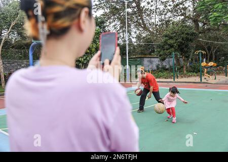 (230210) -- HAIKOU, Feb. 10, 2023 (Xinhua) -- Cartoonist Liu Ke poses ...