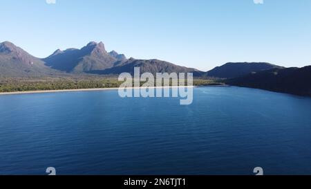 Aerial shot of Zoe Bay with the beach and mountains of Hinchinbrook ...