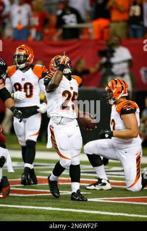Cincinnati Bengals running back Giovani Bernard runs down a row of ...