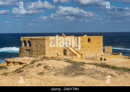 Qbajjar Bay, Gozo - October 13th 2020: Qolla l-Bajda Battery is an ...