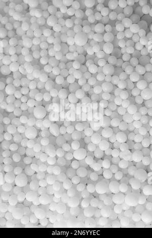 Pellets of ammonium nitrate as background, top view. Mineral fertilizer ...