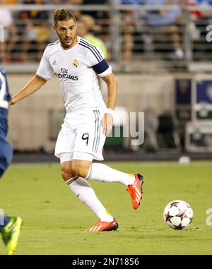 Real Madrid forward Karim Benzema (9) celebrates after scoring a ...