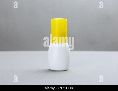 Bottle with insect repellent spray on grey background Stock Photo - Alamy