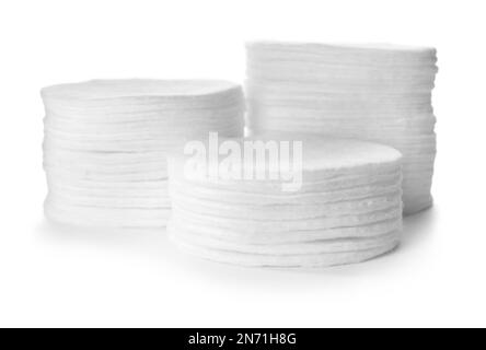 Stacks of cotton pads on white background Stock Photo - Alamy