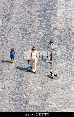 Trencin (Trentschin): woman with dog and children from above on ...