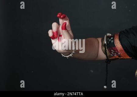 A close up of Hand gestures of an Odissi dancer, Indian classical dance ...