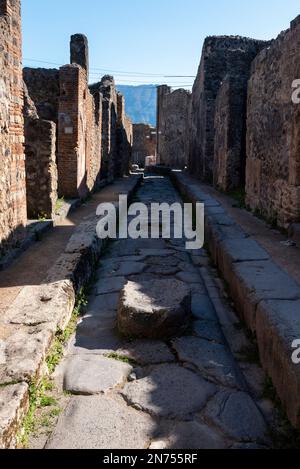 A crosswalk of a typical Roman road in the ancient city of Pompeii ...